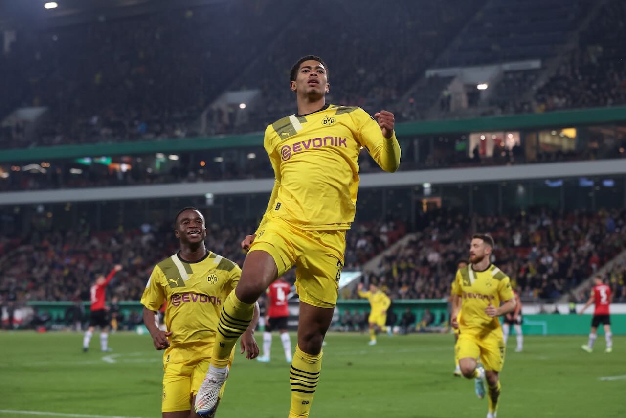 Bellingham brace helps six-goal Dortmund keep pace with Bayern - The ...